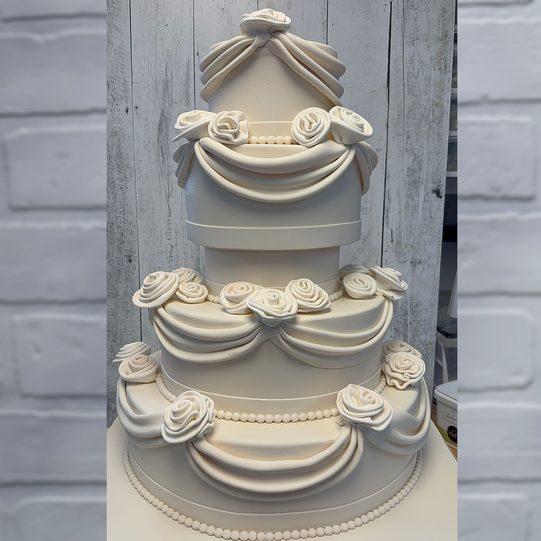 White Rosey Drapes Wedding Cake - Palermo Custom Cakes